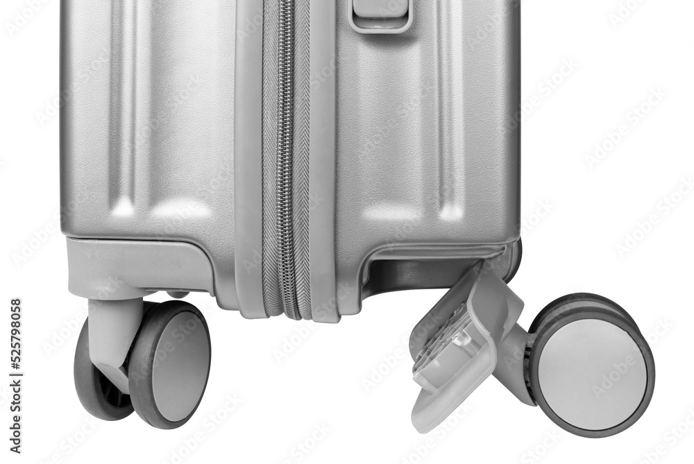 A missing wheel on a travel suitcase. Broken suitcase. Broken suitcase ...