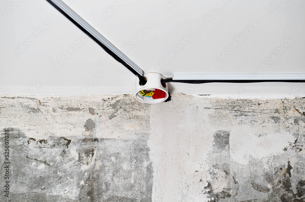 Connection of electrical wires in electrical boxes using red caps of ...