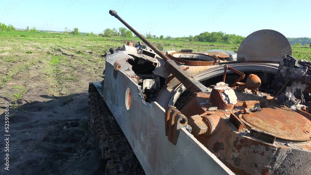 2022 - a destroyed Russian tank sits rusting on the battlefield near ...