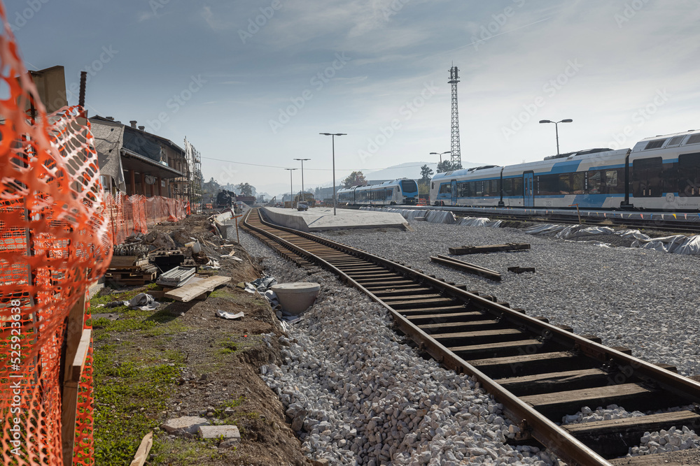 Foto Stock Train station is being renovated, trains stopped at a ...