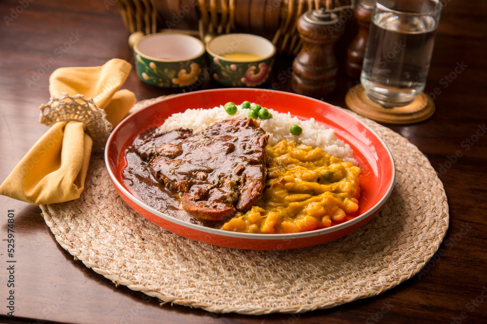 Fried cow liver with locro pumpkin stew Buffet table Peruvian comfort ...