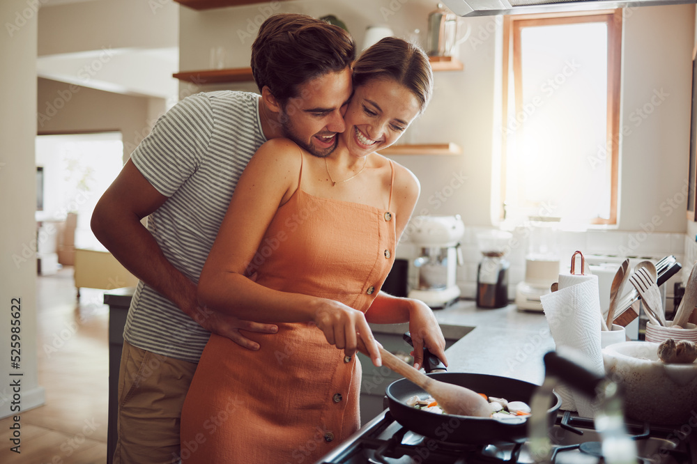 Foto de Happy, loving and cooking couple bonding and having fun while ...