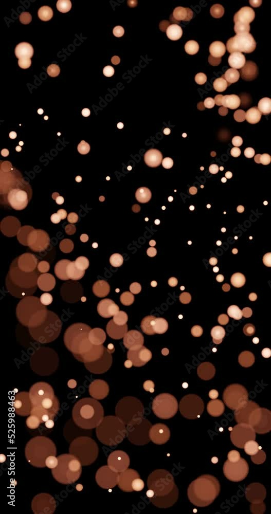 Abstract floating bokeh light, glitter particles flowing up swirly ...