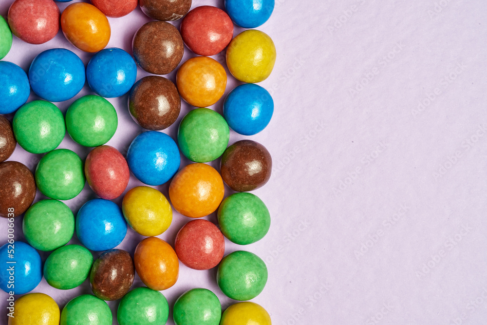 New MMs on a beige background. Background from a mms balloon. lots of ...