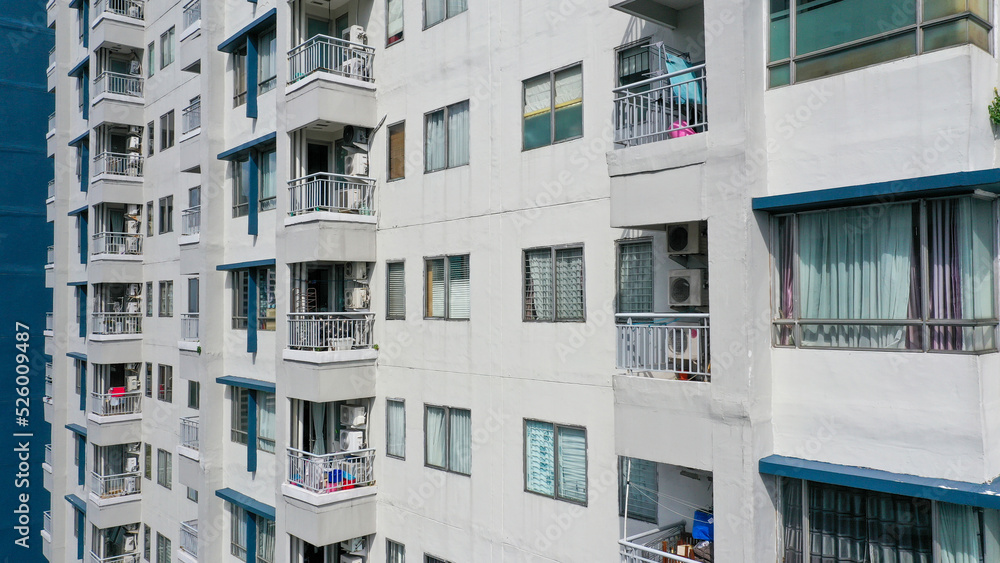 Exterior of a modern high-rise multi-story apartment building condo ...