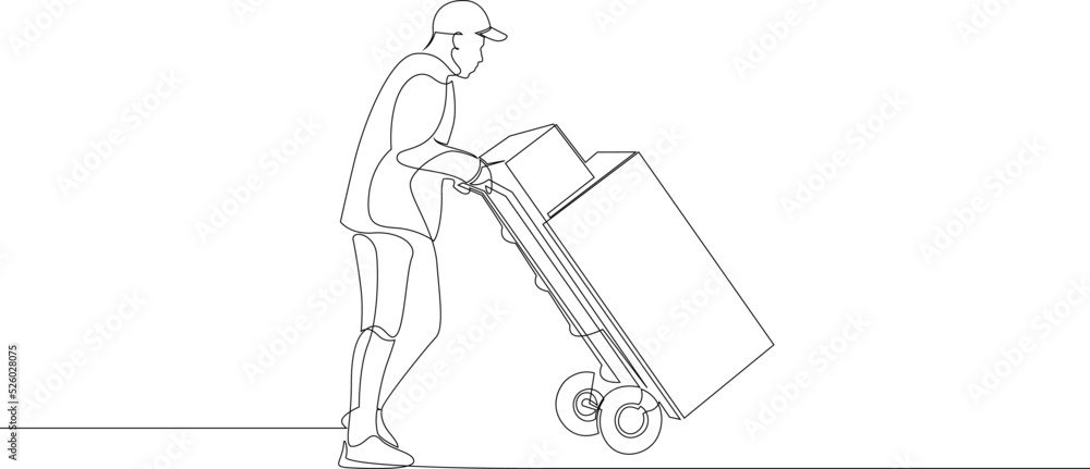 Delivery man carrying cardboard boxes on a trolley. Delivery service ...
