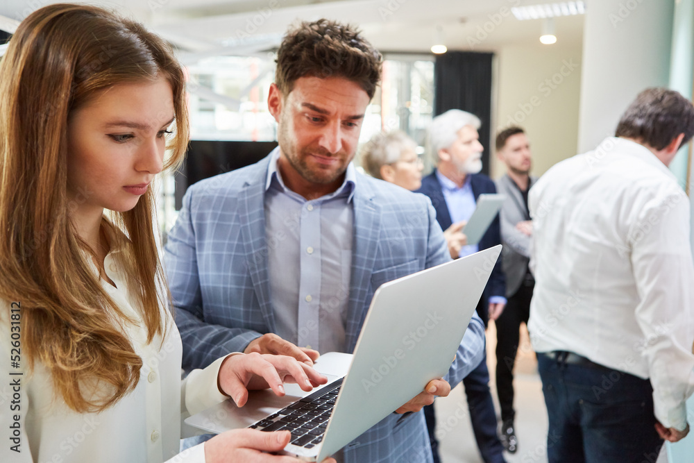 Business people doing research on the laptop PC Stock Photo | Adobe Stock