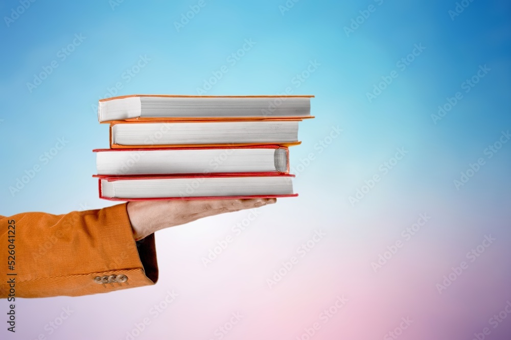 Big pile of books over light background. Education, self-learning, book ...
