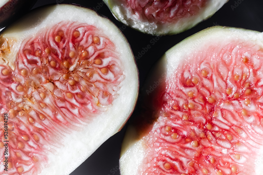 Sectioned fresh fig fruit macro image copyspace. Fresh figs on abstract ...