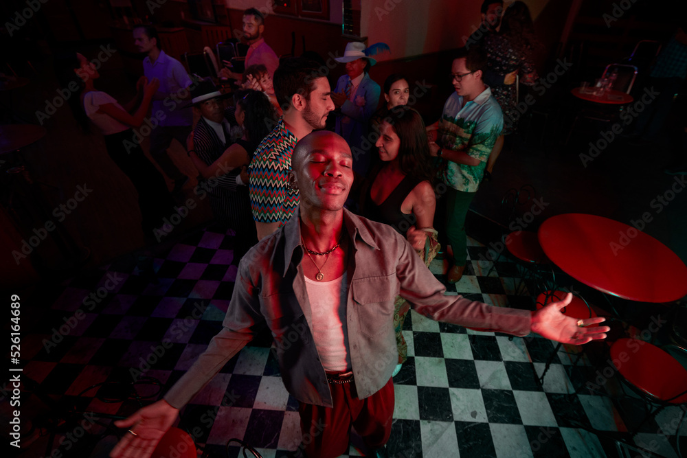 People dancing in club at night Stock Photo | Adobe Stock