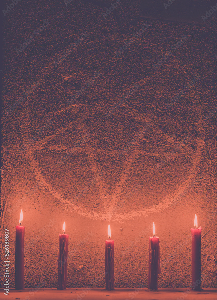 White pentagram symbol on concrete wall. Satanic altar illuminated with ...