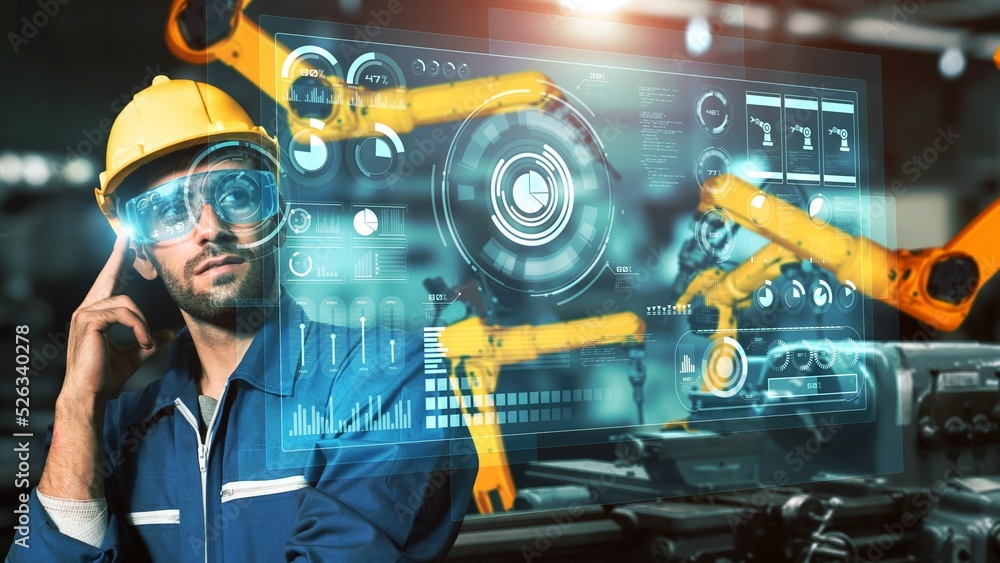 Engineer use cybernated robotic software to control industry robot arm ...