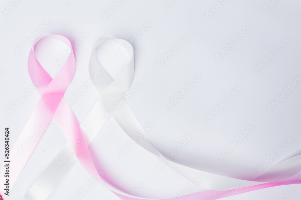 Pink ribbon fight against breast cancer and white ribbon to fight ...