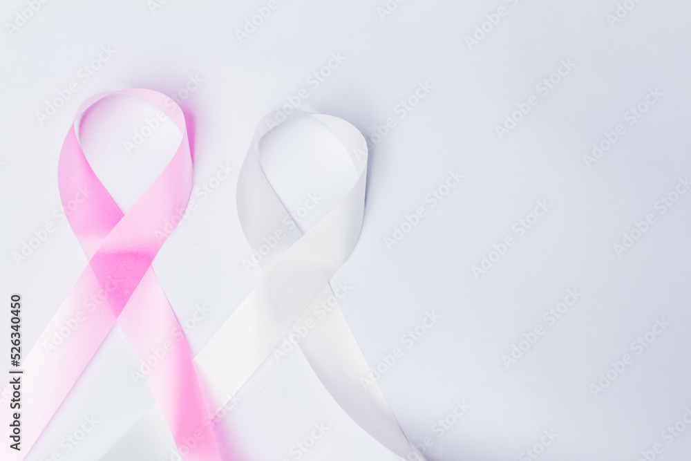 Pink ribbon fight against breast cancer and white ribbon to fight ...