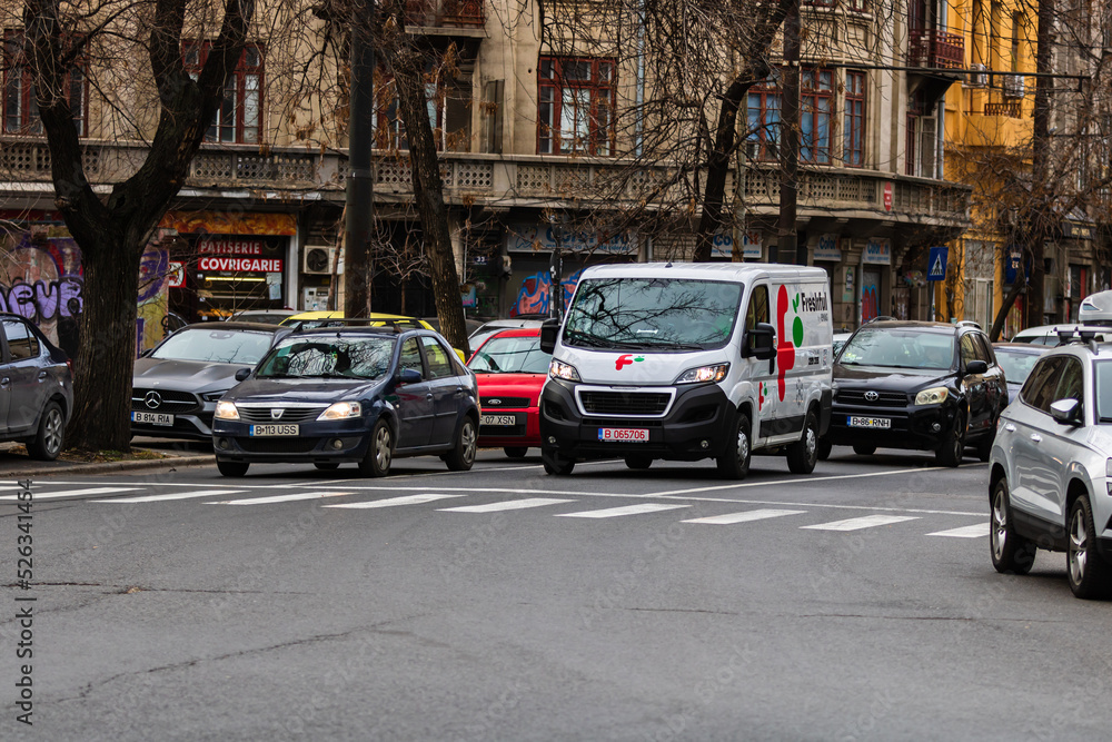Car traffic at rush hour in downtown area of the city. Car pollution ...