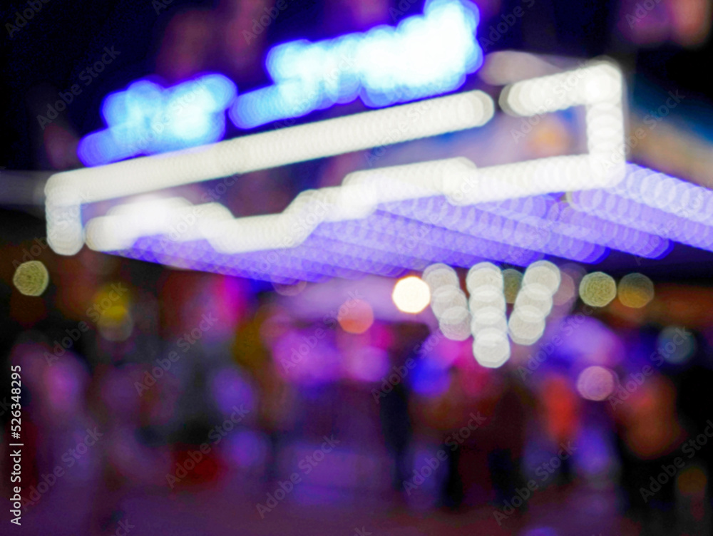 Amusement park ride or carnival rides at night with bright colorful ...