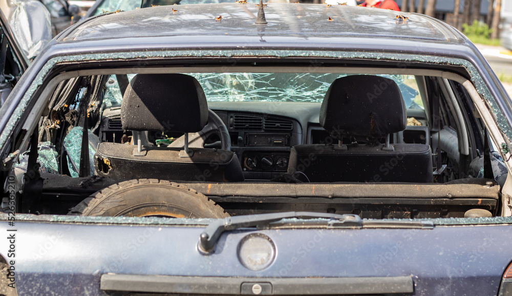 A car after an accident with a broken rear window. Broken window in a ...