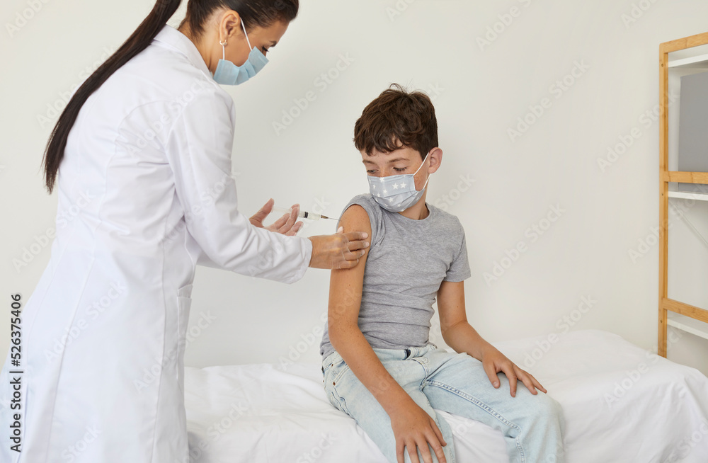 Child getting vaccine injection for covid, flu, monkeypox or other ...
