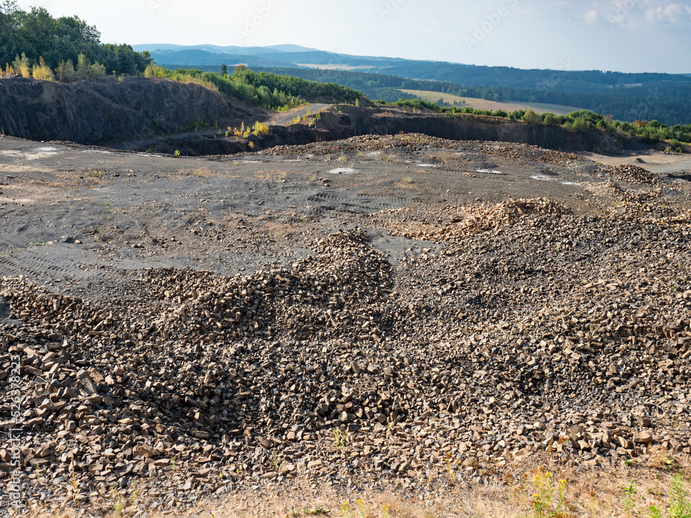 Basalt quarry. Marks of excavator operating in a rock quarry. Stock ...