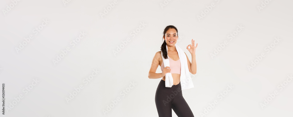 Sport, gym and healthy body concept. Full length of satisfied smiling ...