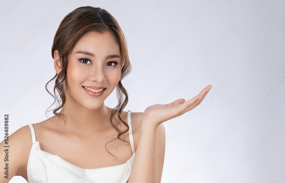 Photo of a gorgeous woman with flawless healthy fresh skin in a concept of empty space for ...