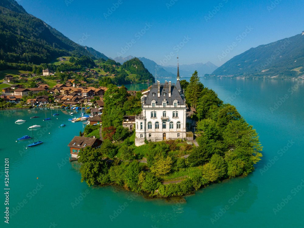 Picturesque Castle Seeburg in the village of Iseltwald at Lake Thun ...