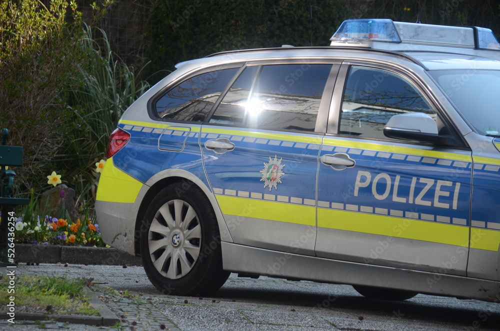 Germany June 2019: A German police car in action is parked in a square ...