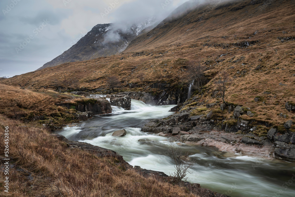 Stunning Winter landscape image of River Etive and Skyfall Etive ...