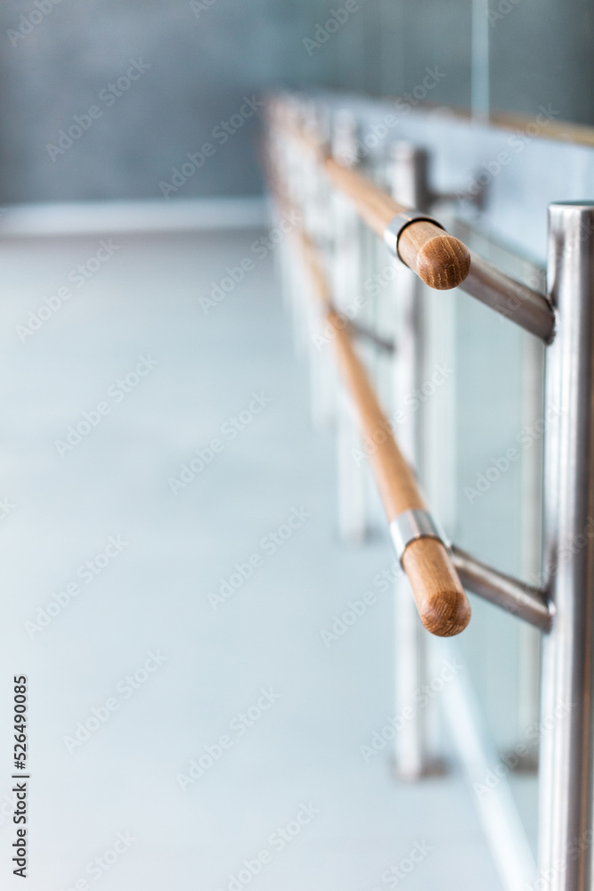 Ballet barre in dance class room. Blurred background of modern dancing ...