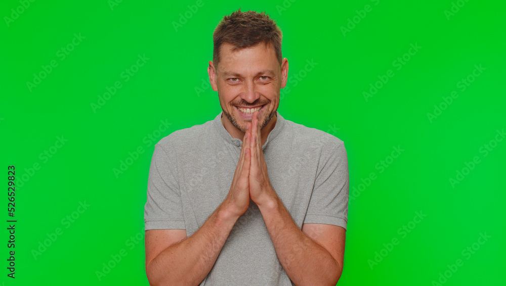 Sneaky cunning handsome man with tricky face gesticulating and scheming ...