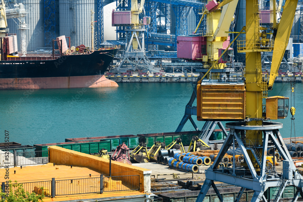 industrial infrastructure of the seaport, the sea, cranes and railway ...