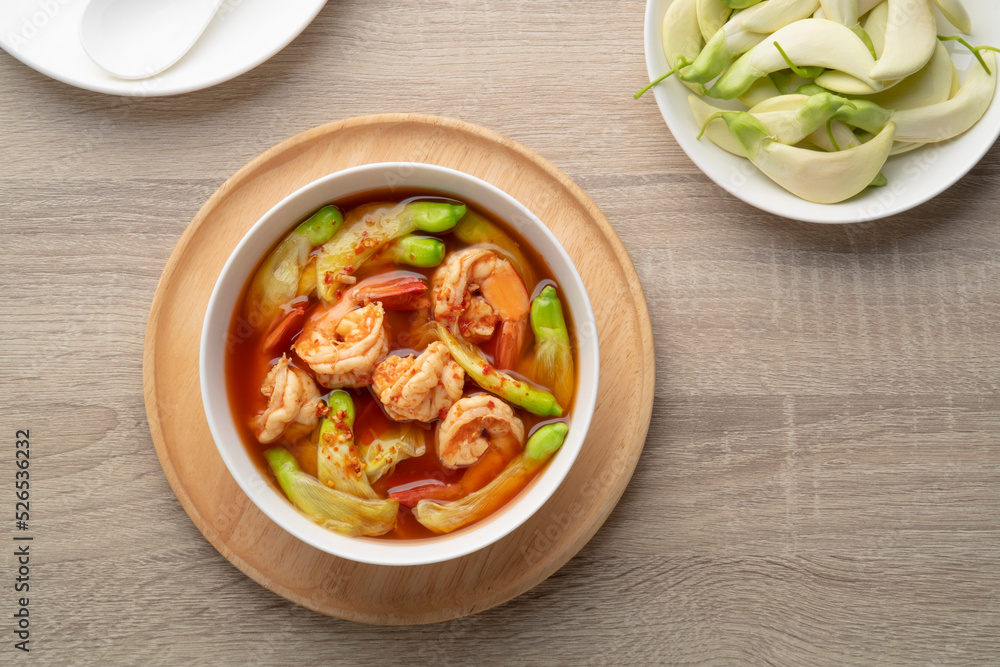 Hot and spicy sour soup with Katuri Flower with shrimp in white bowl ...