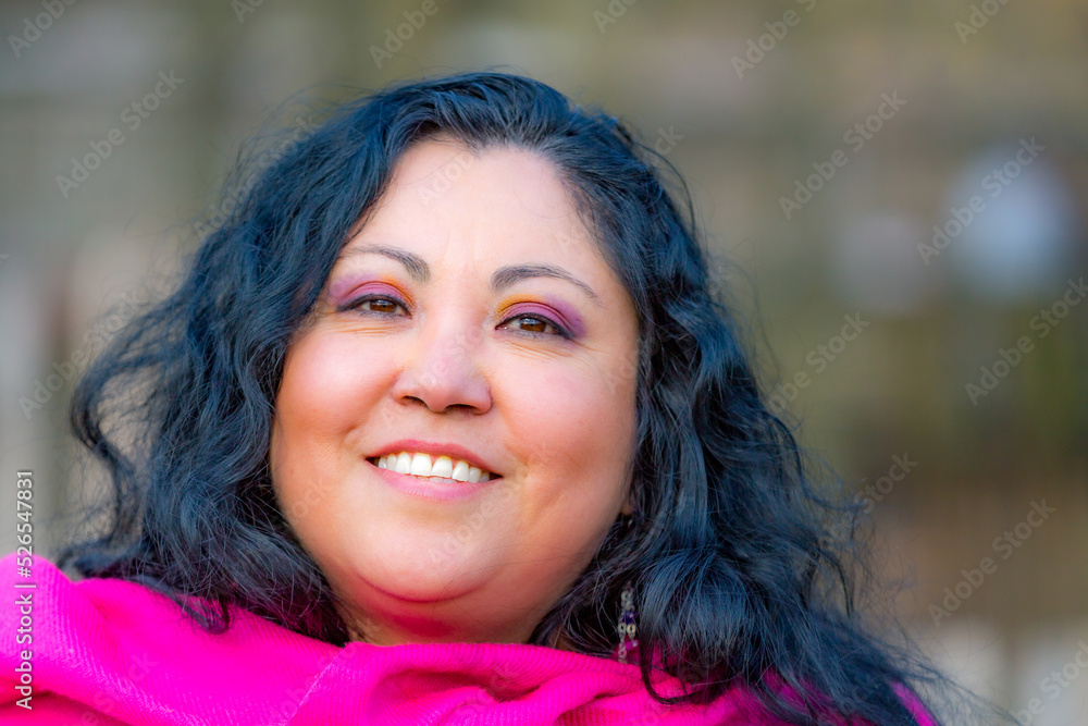 Portrait of the face of a beautiful chubby Mexican woman smiling ...