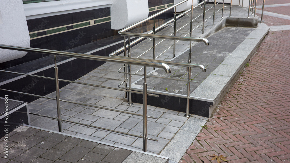 metal steel railings facade path near the building, path for the ...
