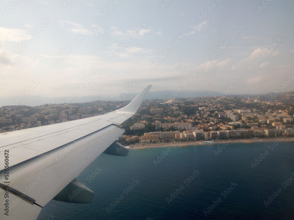 Scenic panoramic view of the city from the plane window. Natural beauty ...