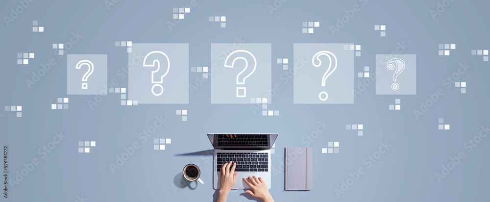 Question marks with person working with a laptop Stock Photo | Adobe Stock
