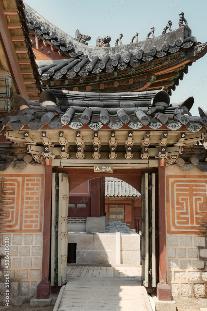 Traditional colorful Korean wooden temple entrance door design at ...