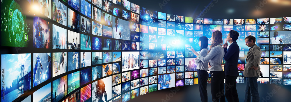 Multinational people watching videos. Video library. Wide image for ...