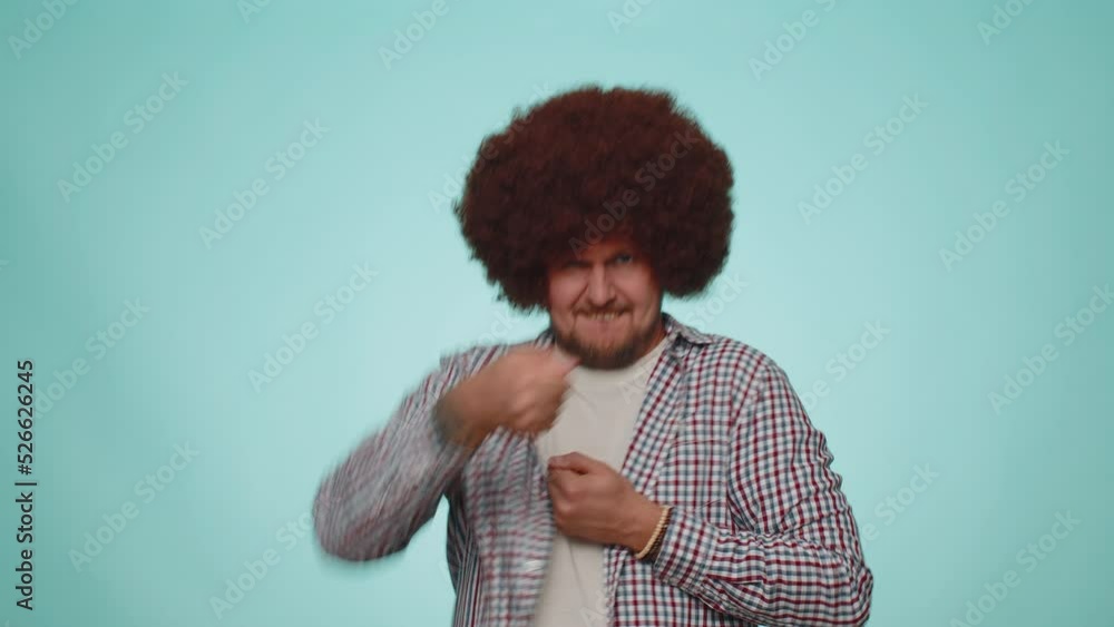 Mime man with lush hairstyle pulling an imaginary unreal invisible rope ...