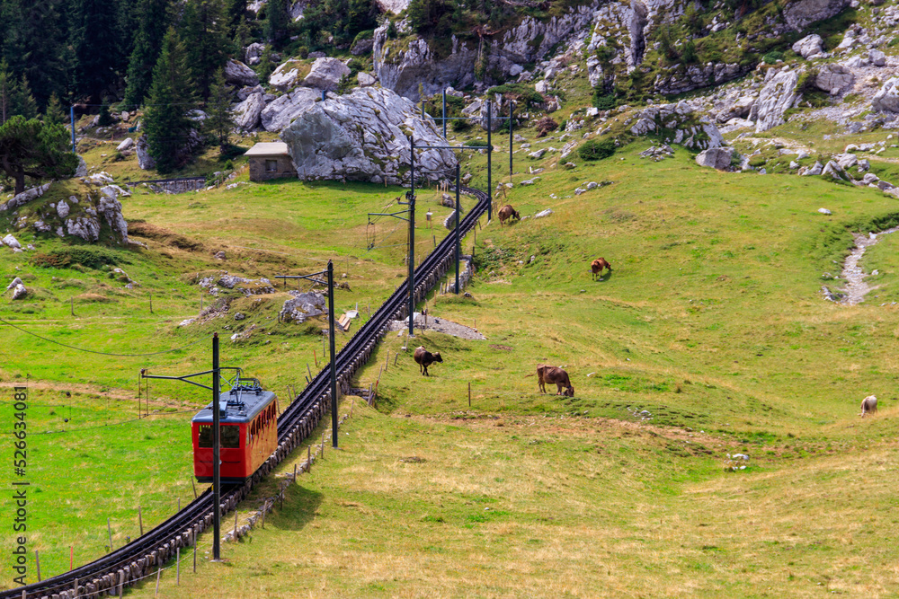 Cogwheel train climbing to the top of Mount Pilatus in Canton Lucerne ...