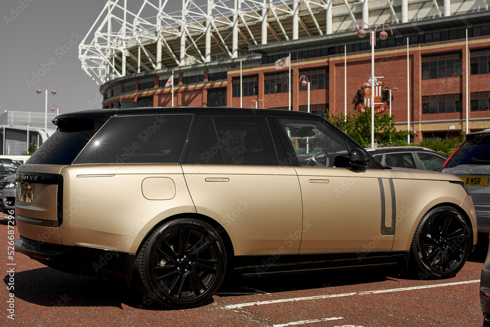 UK, Newcastle, 27 August 2022: Land Rover Range Rover 2022. Side view ...