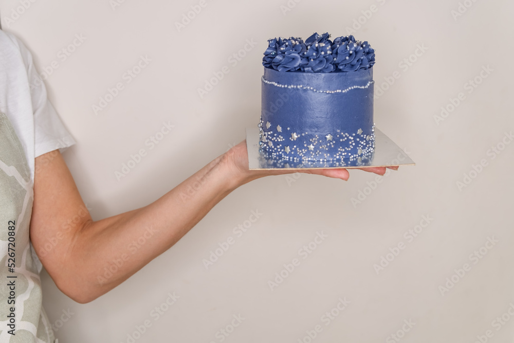 Beautiful young woman with a chocolate cake. Birthday cake with ...