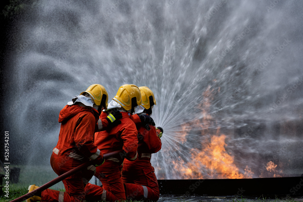 In Industry safety fire fighter team department on training fight with ...