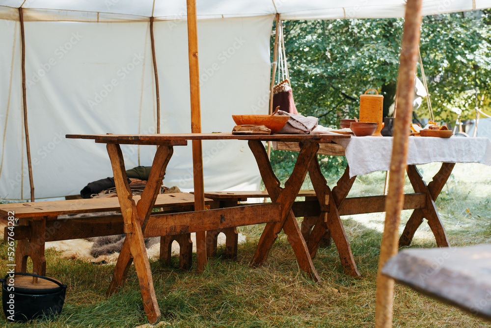 The interior of a medieval camping peasant kitchen in the open air ...
