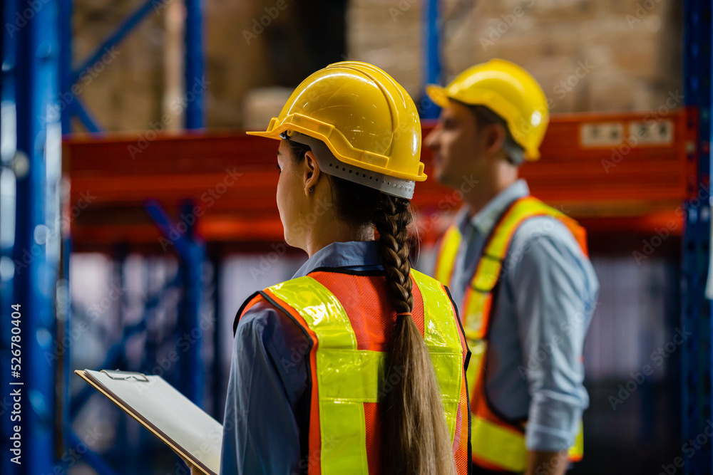 Warehouse workers and managers are also checking inventory stock in the ...