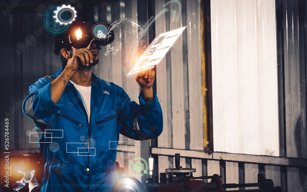 Mechanic wearing uniform, VR virtual reality glasses to analyze, repair ...
