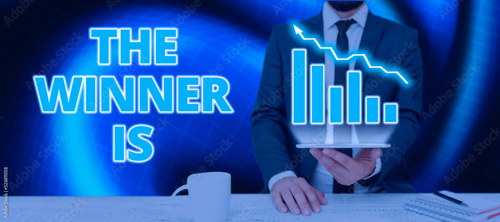 Conceptual caption The Winner Is.... Business showcase Announcing who ...