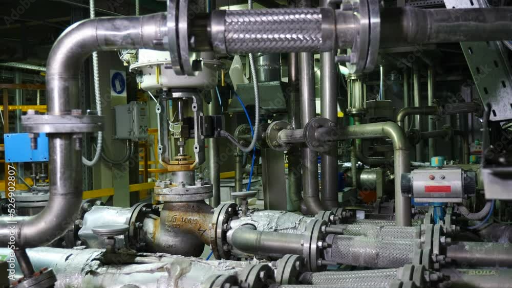 Chemical plant inside. Modern equipment. Refinery pipelines. Interior ...