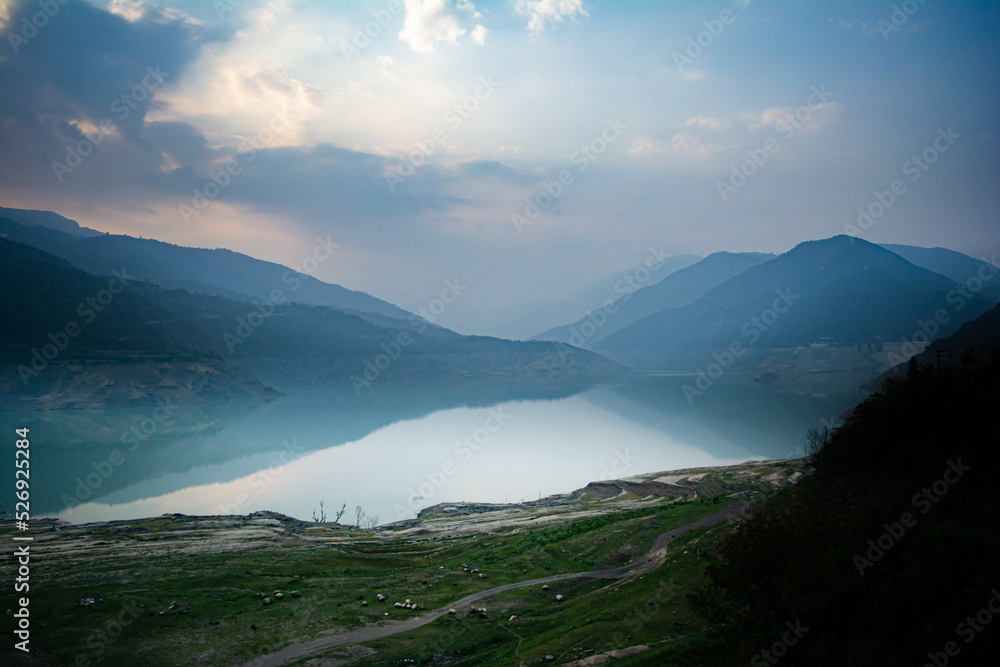 Sunrise view of Tehri mountains. Scenery sunrise over Tehri Lake ...