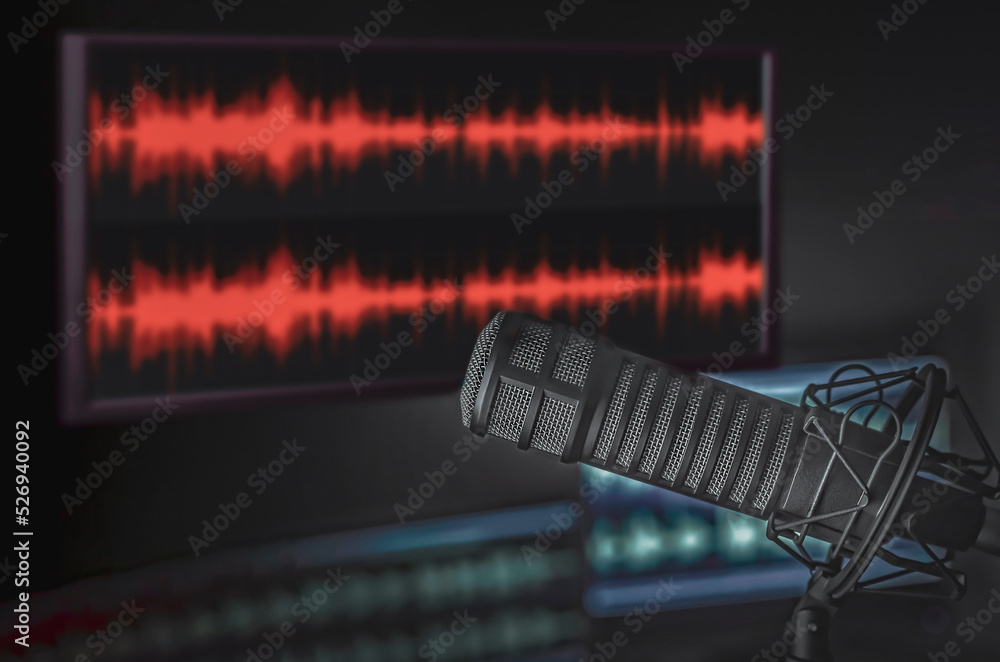 professional microphone and sound wave form on computer screen Stock ...